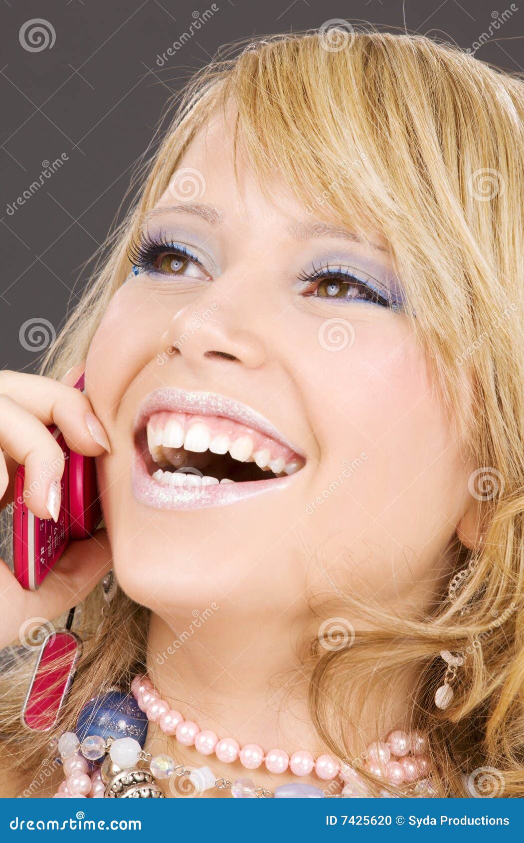 Happy girl with pink phone stock photo. Image of emotion - 7425620