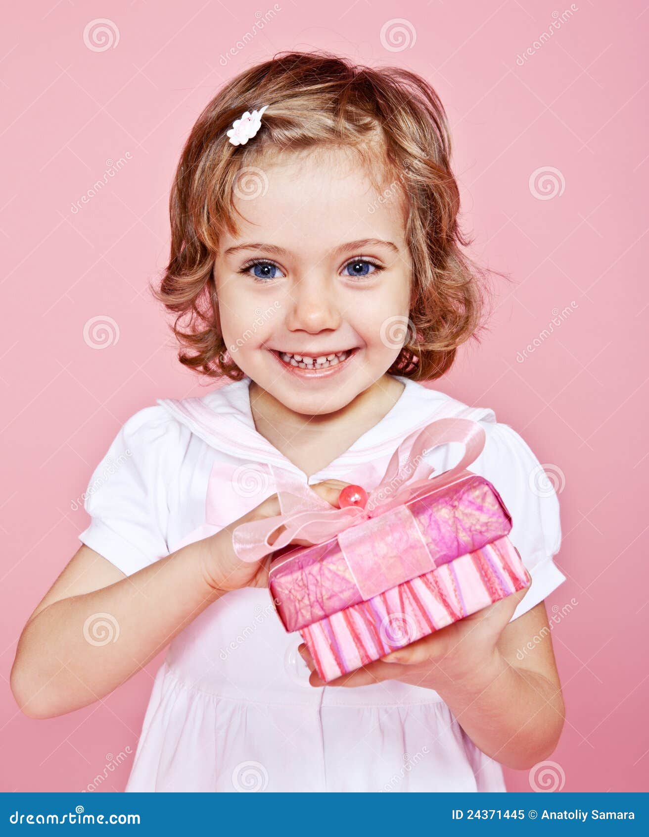 Happy girl with present stock image. Image of little - 24371445