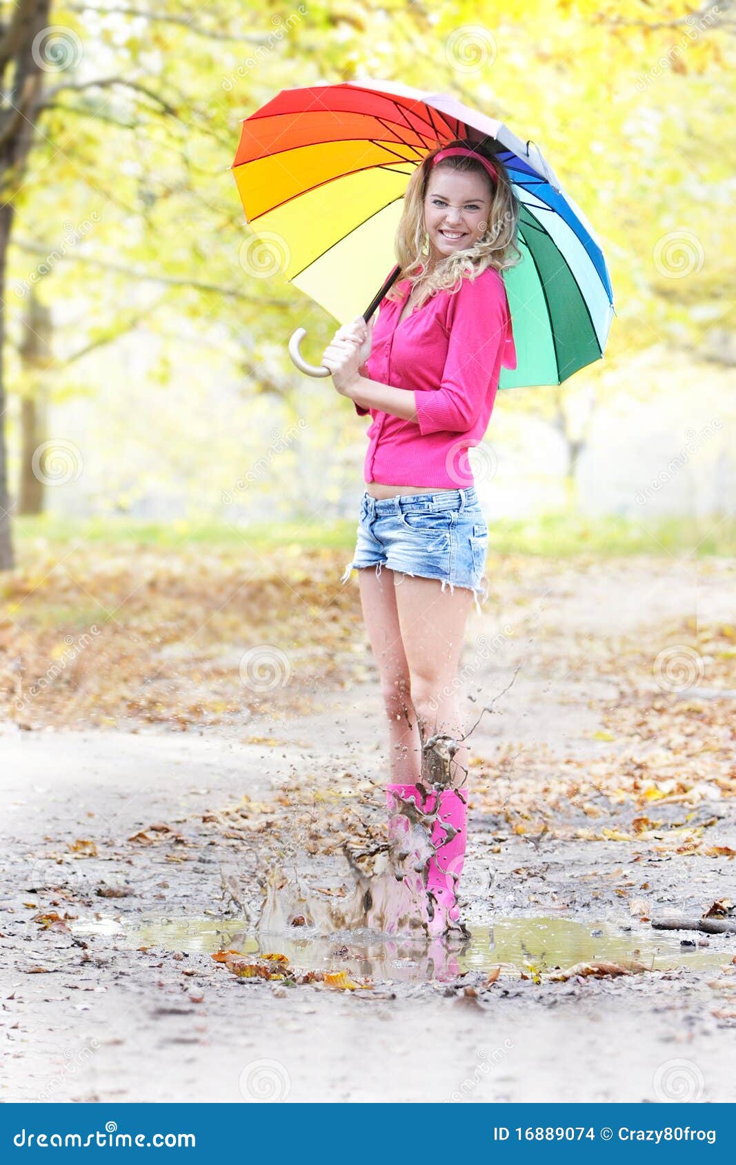Happy girl in puddle stock photo. Image of natural, drop - 16889074