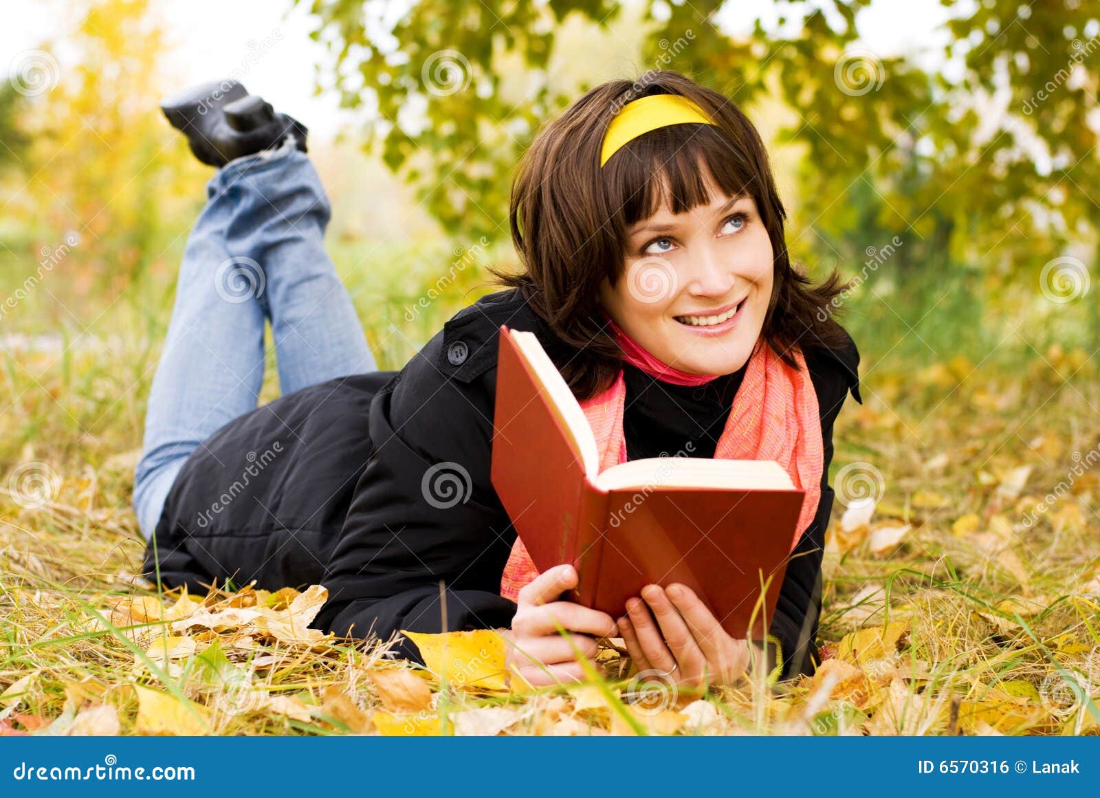 Happy girl reading a book stock photo. Image of attractive - 6570316