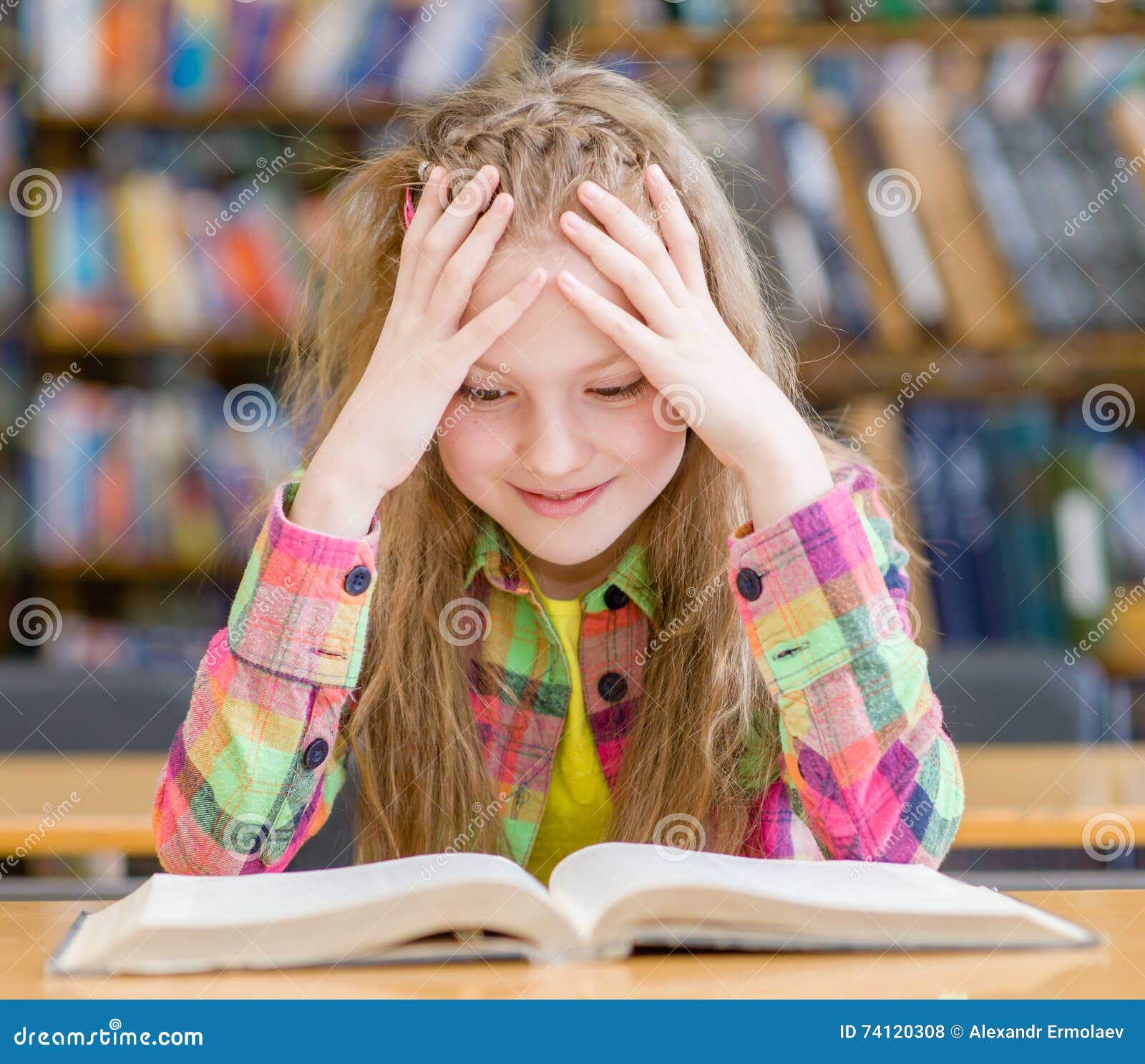 Happy Girl Reading a Book in the Library Stock Photo - Image of primary ...
