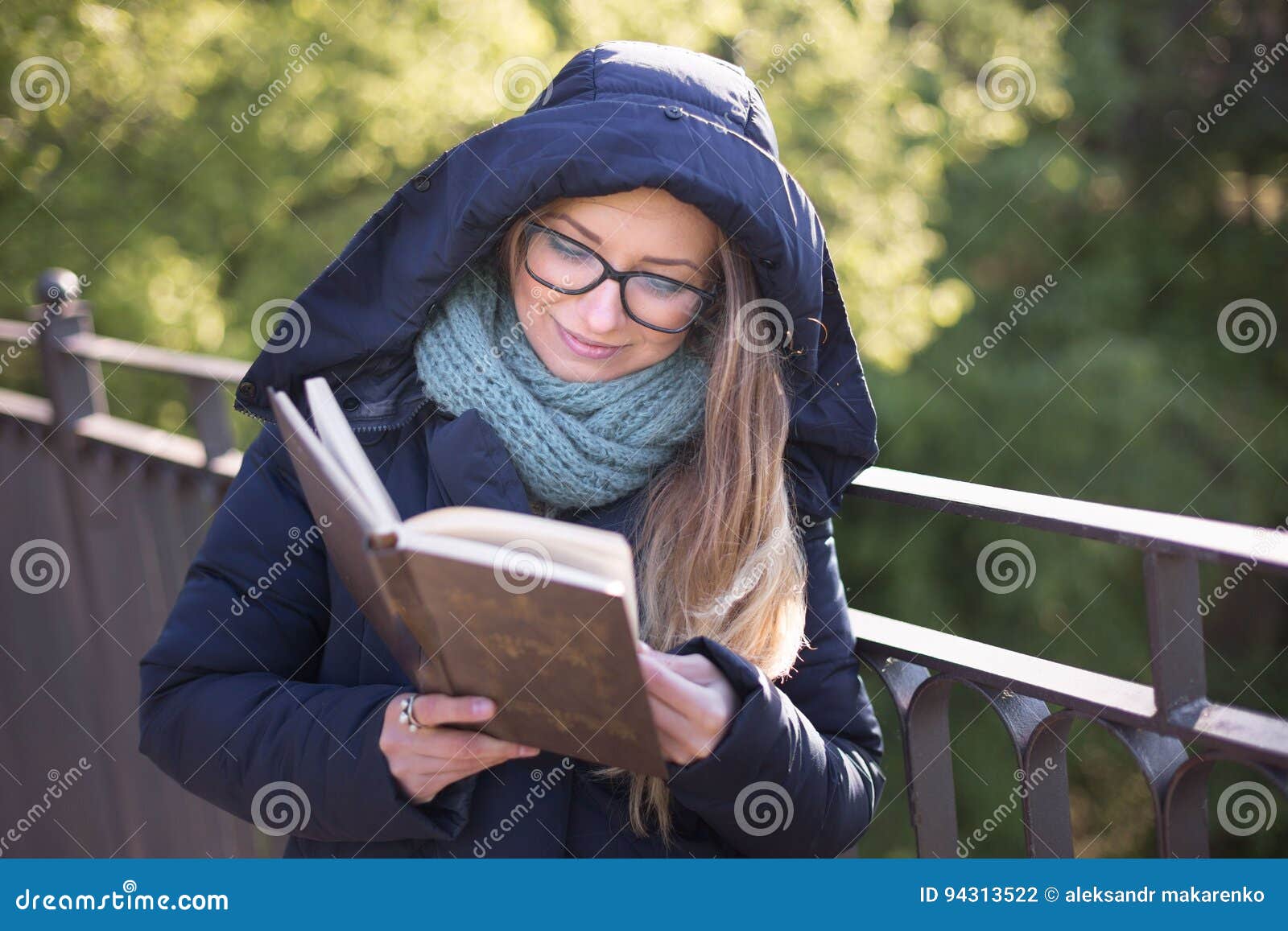 Happy Girl Reading a Book at the Railing. Stock Photo - Image of alone ...