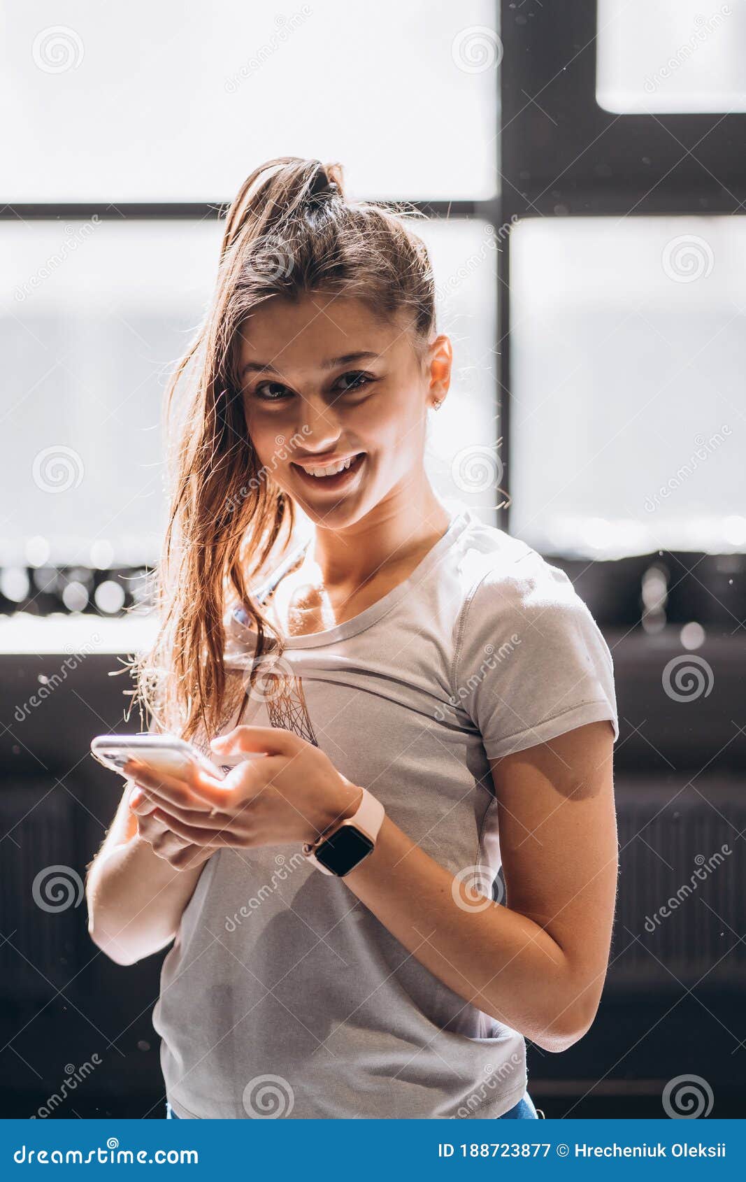 Happy Girl Reading a Message in a Smart Phone at Home Stock Image ...