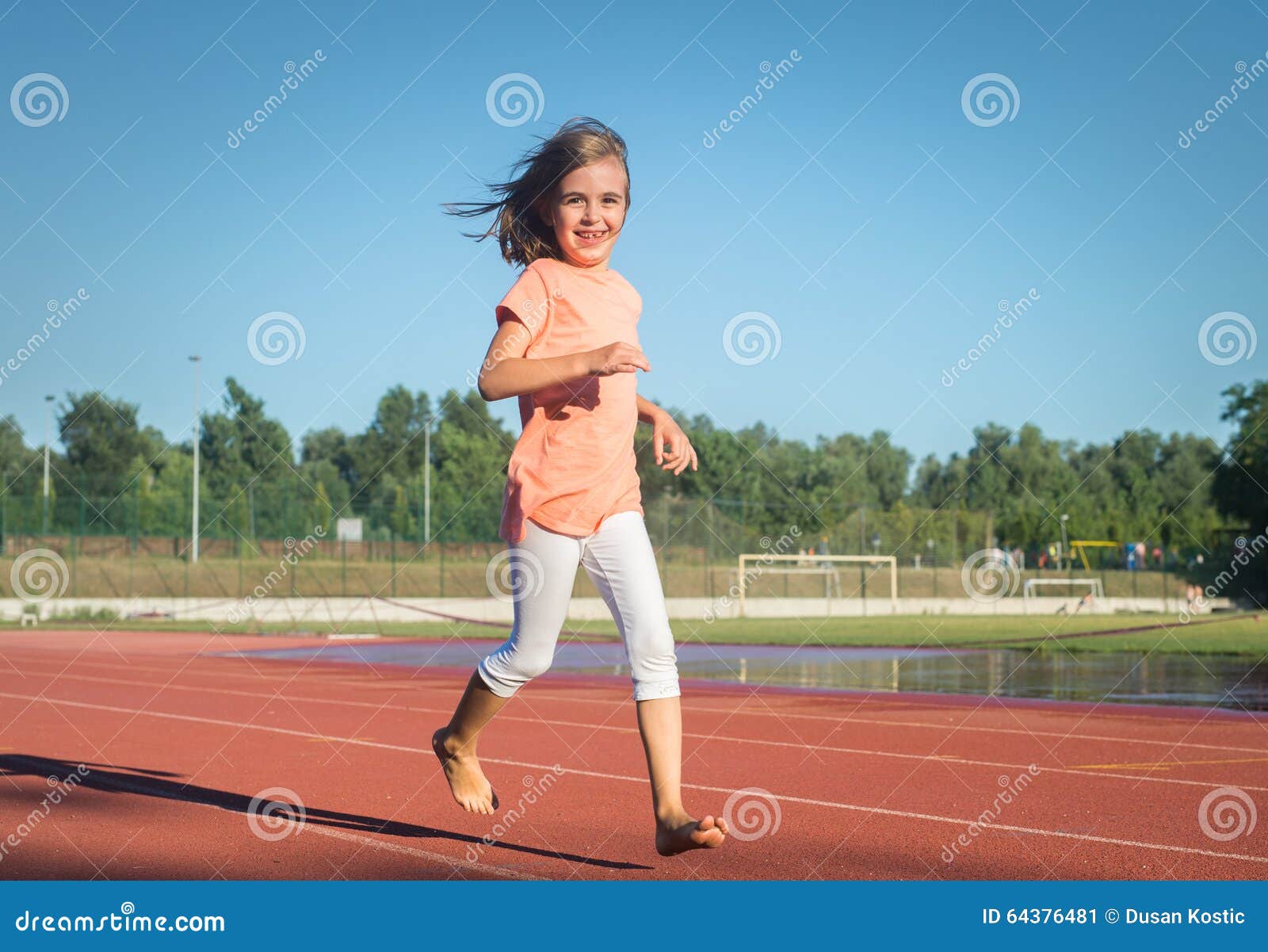 Happy girl run stock image. Image of blonde, girl, outdoor - 64376481
