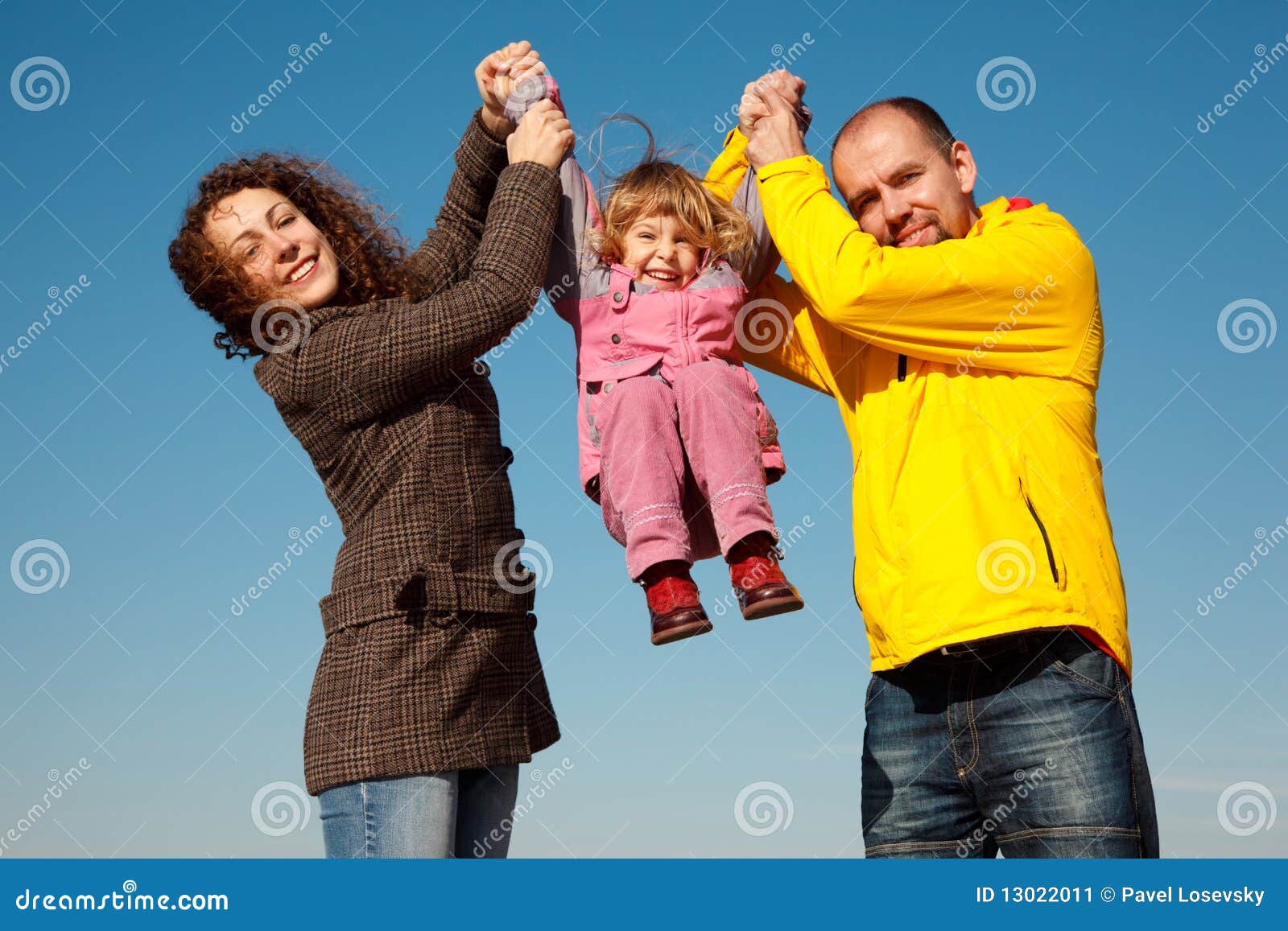 Happy Girl Shakes on Hands at Parents Stock Image - Image of parent ...