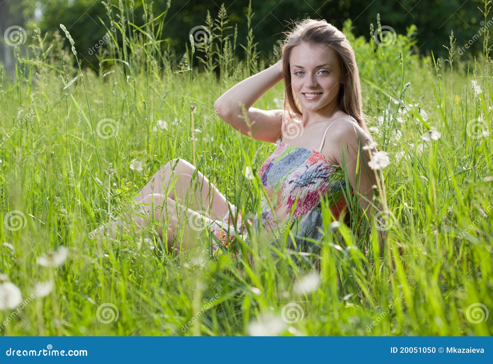 Happy Girl Sitting in a Grass Stock Photo - Image of dress, happy: 20051050