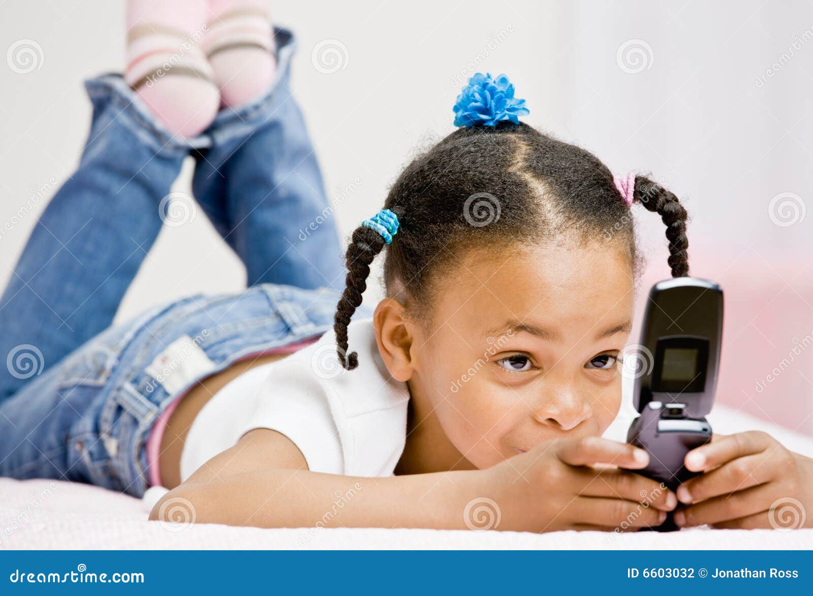 Happy Girl Text Messaging on Cell Phone Stock Photo - Image of people ...