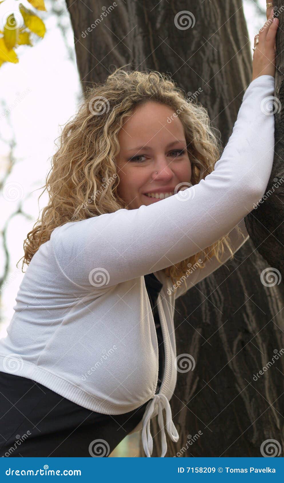 Happy girl by tree stock image. Image of colored, brow - 7158209