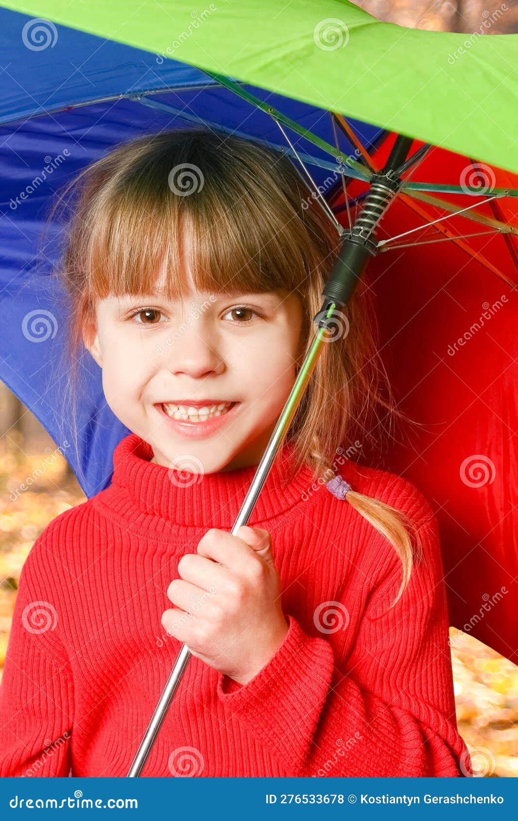 A Happy Girl with Umbrella Outdoors in the Weekend Park Stock Photo ...