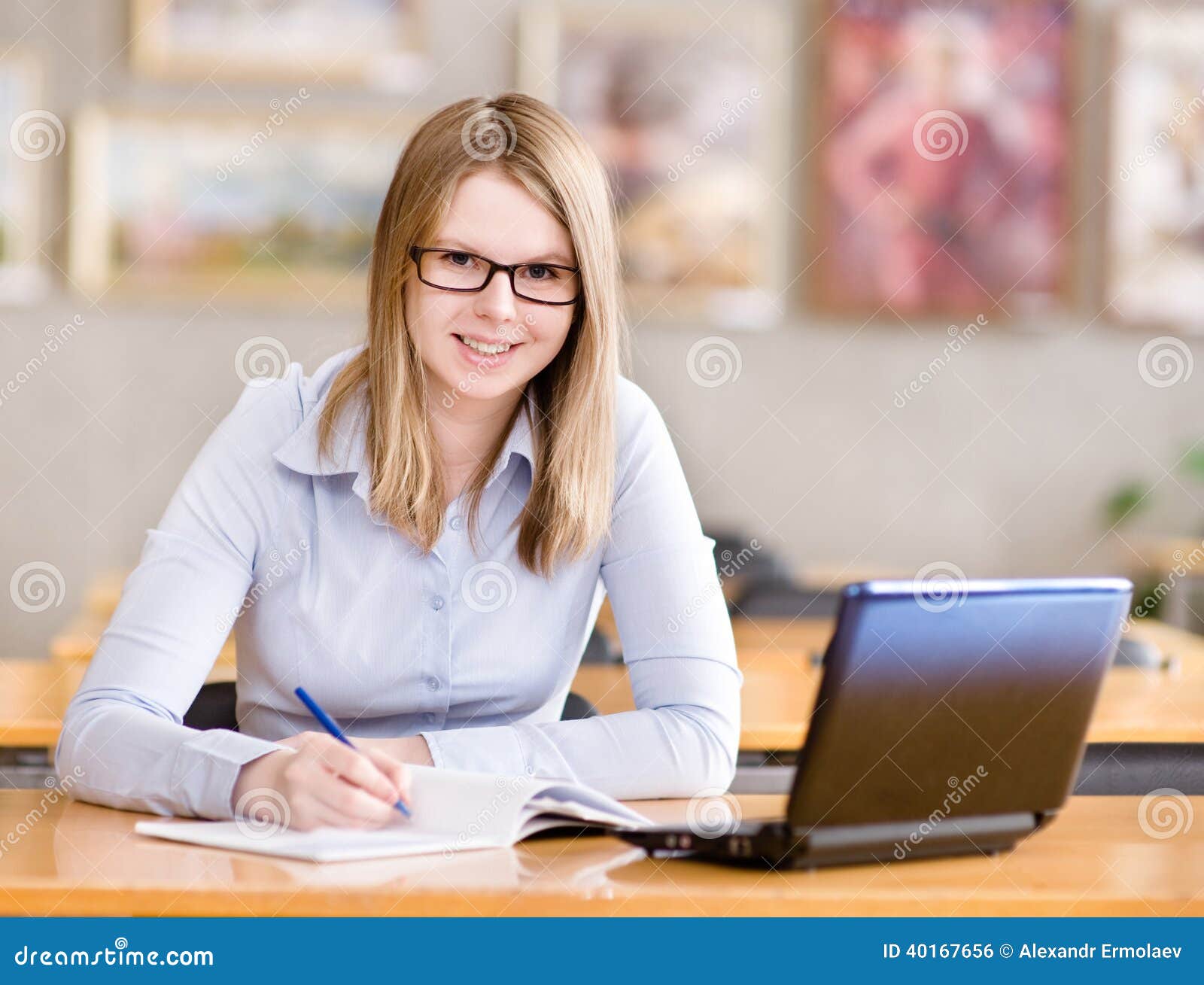 Happy Girl Using Computer in a Library. Stock Photo - Image of ...