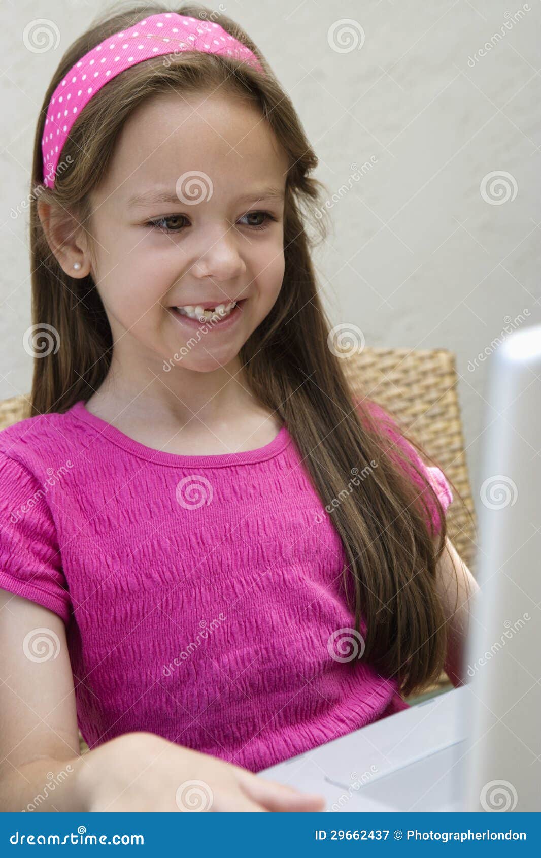 Happy Girl Using Laptop stock image. Image of pink, indoors - 29662437