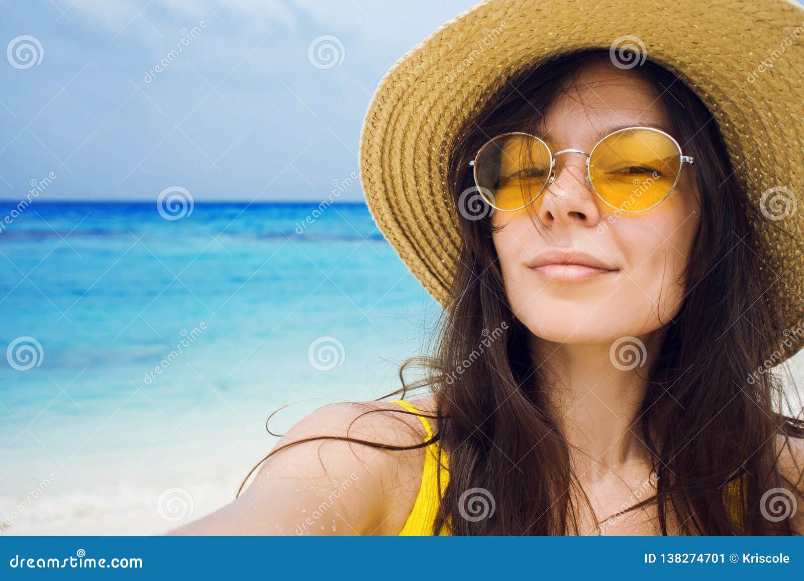 Happy Girl On Vacation Young Brunette In A Straw Hat And Sunglasses