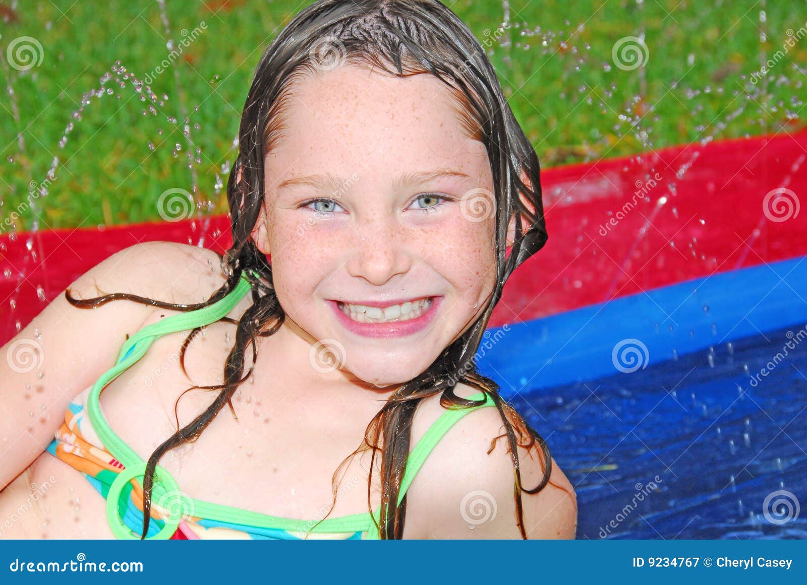 Happy girl in water play stock image. Image of spray, slide - 9234767