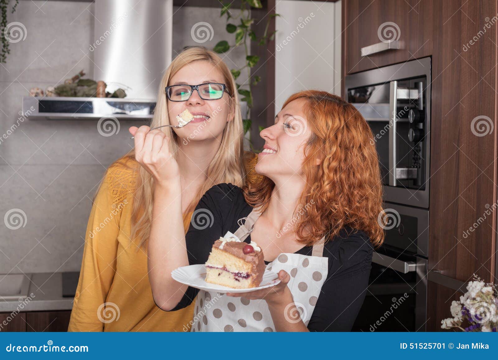 Happy Girlfriends Eating Cake in the Kitchen Stock Image - Image of ...