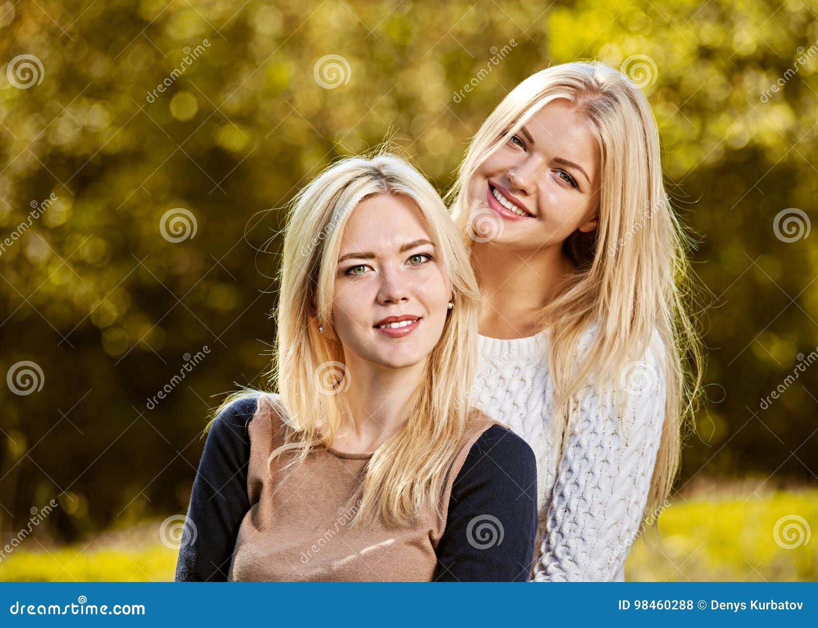 Happy Girlfriends Hugging Portrait Stock Photo - Image of girls ...