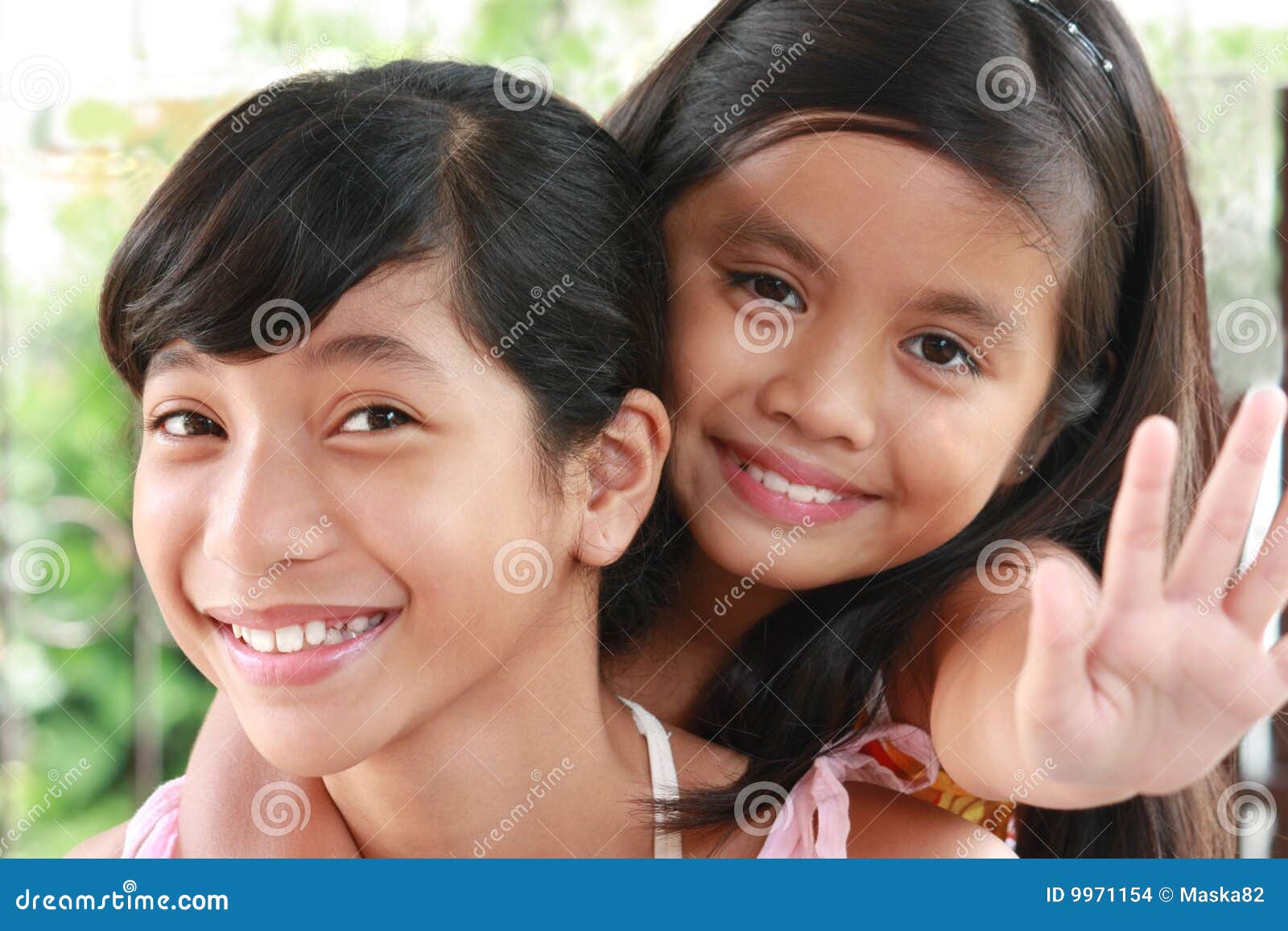 Happy girls stock photo. Image of reaching, smiling, people - 9971154