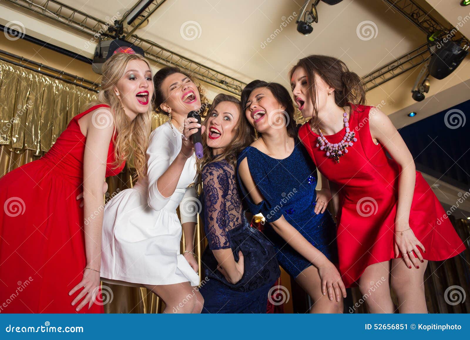 Happy Girls Singing into a Microphone Stock Image - Image of dancing ...