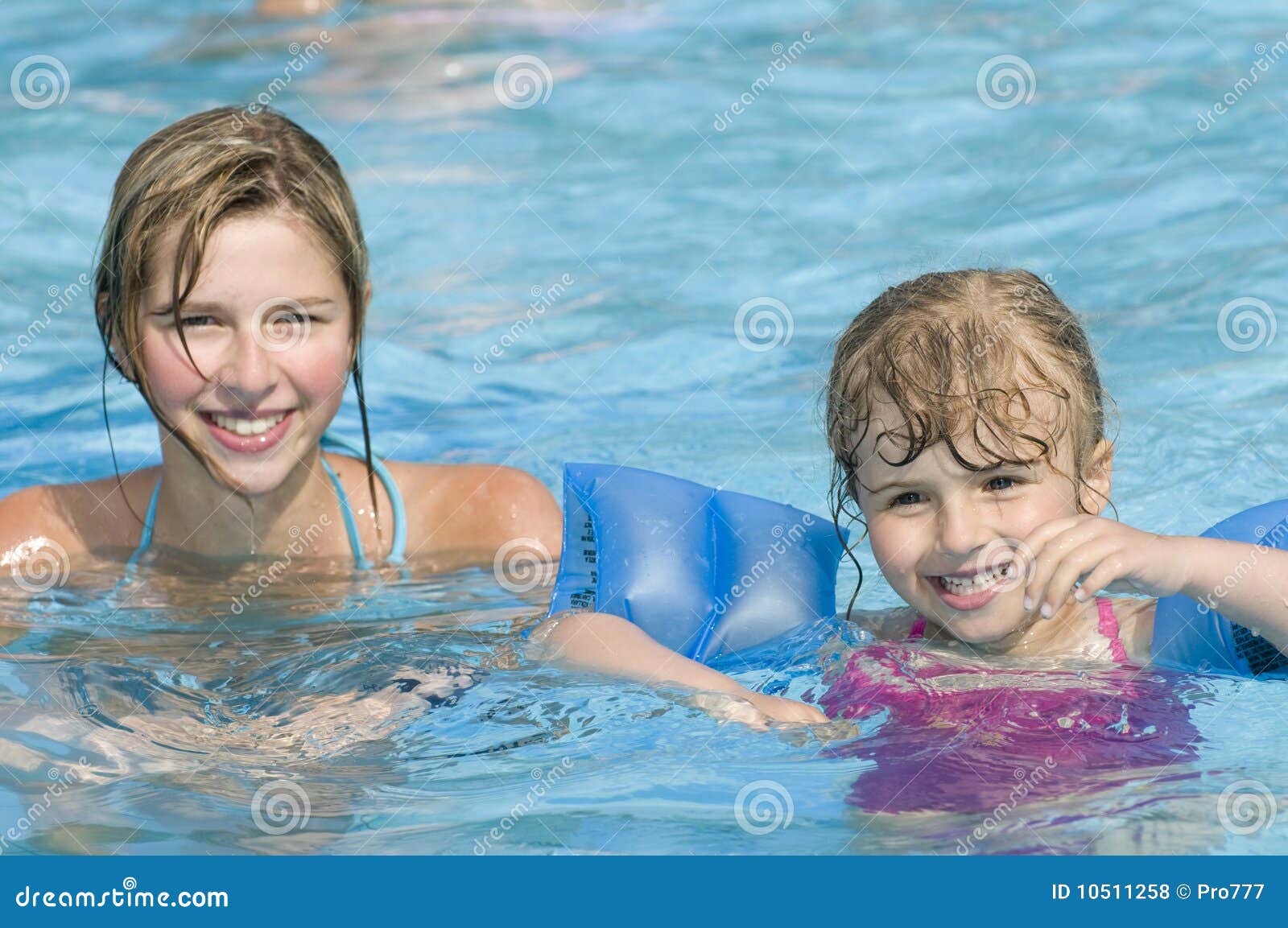 Happy Girls on Swimming Pool Stock Photo - Image of childhood, girl ...
