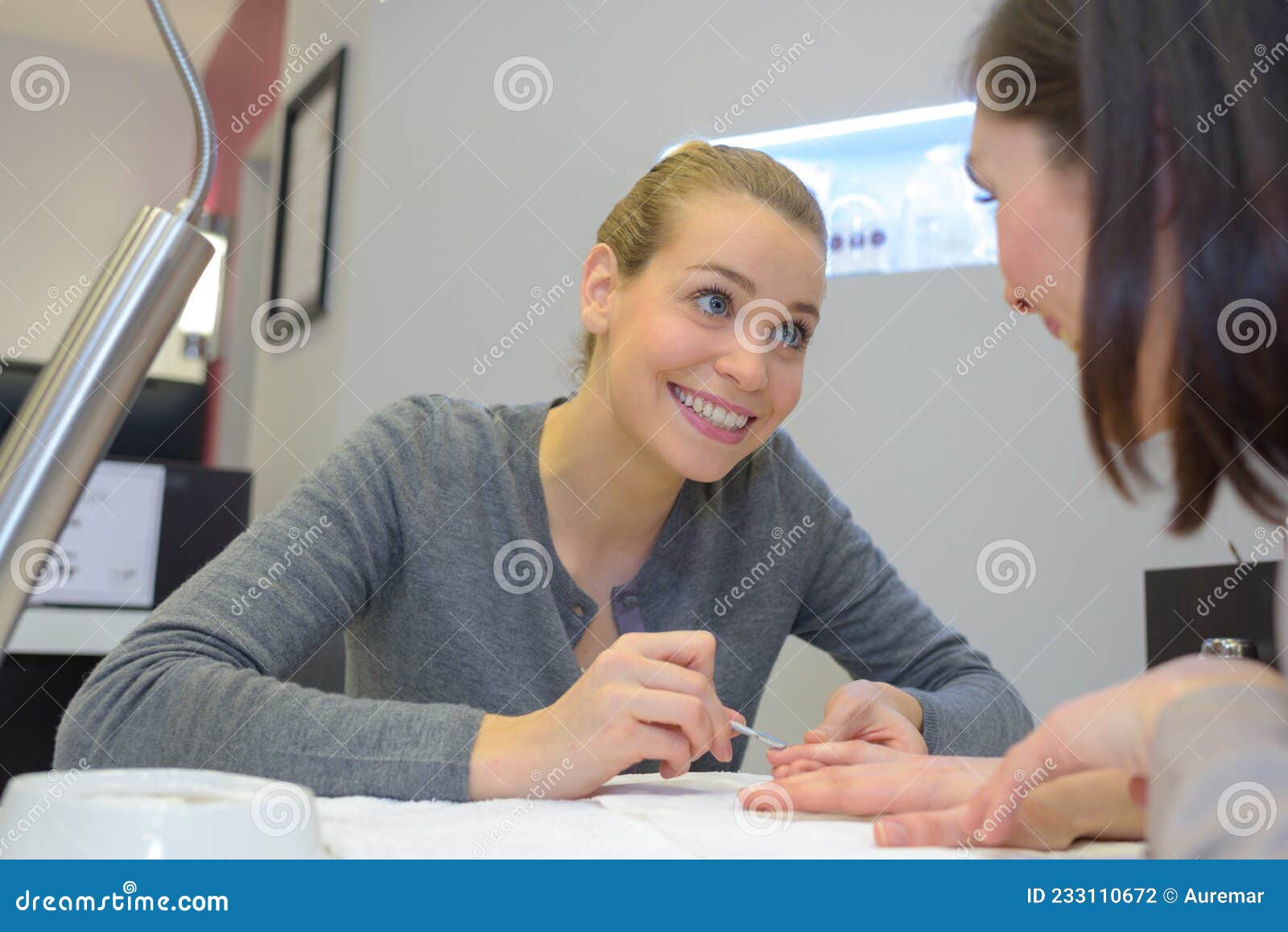 Happy Glad Female Client Doing Nails in Nail Salon Stock Photo - Image ...