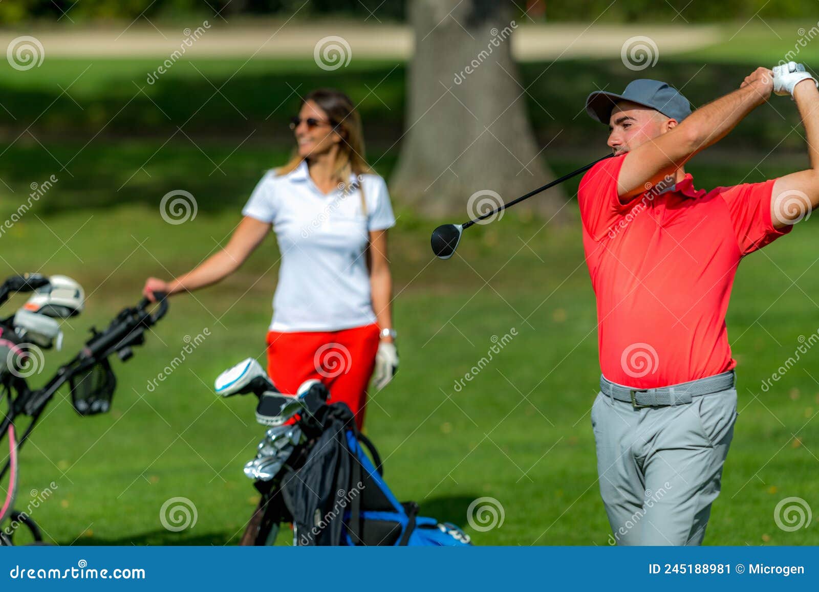 Happy Golf Couple on a Golf Course Stock Image - Image of enjoying ...