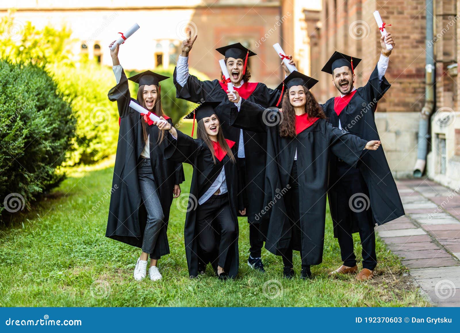 Happy Graduates. Five College Graduates Standing in a Row and Smiling ...