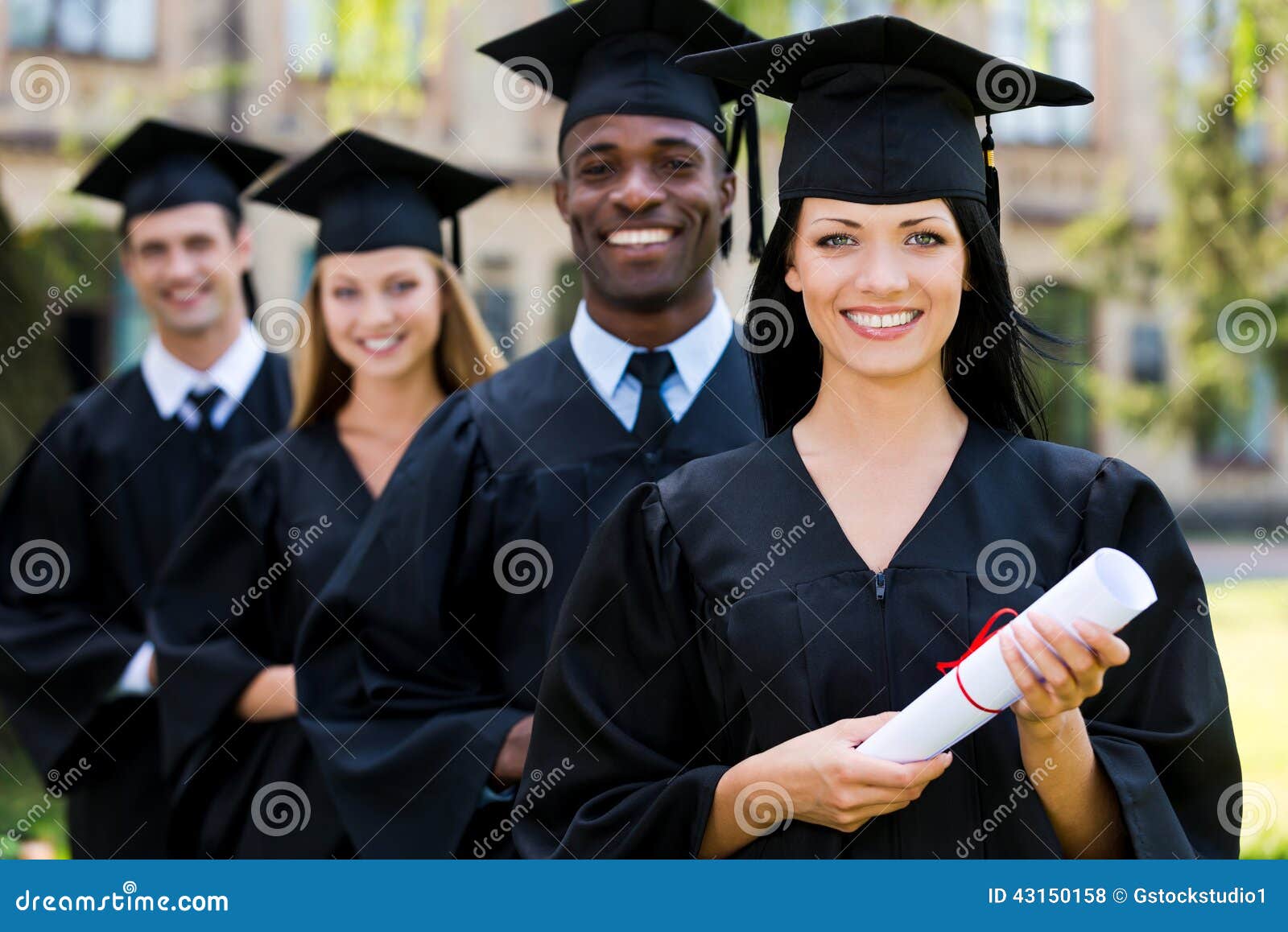 Happy graduates. stock photo. Image of gown, beauty, graduates - 43150158