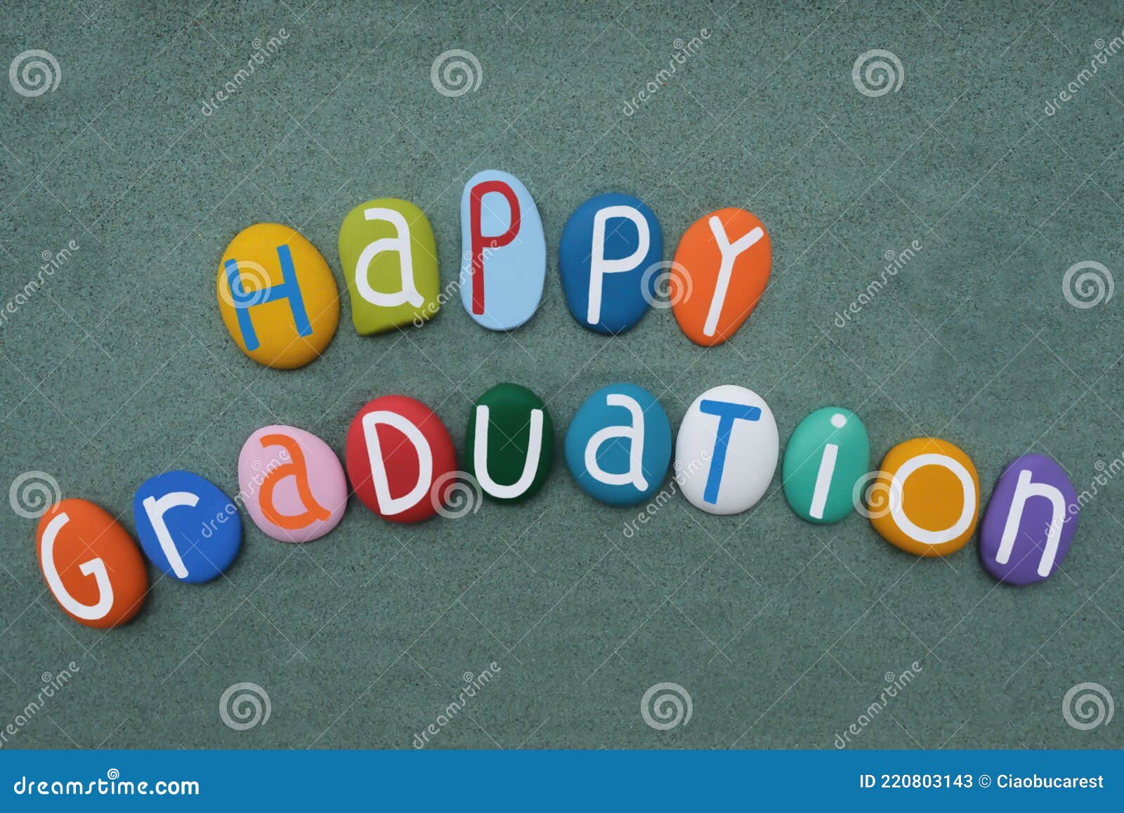 Happy Graduation Text Composed with Multi Colored Stone Letters Over ...