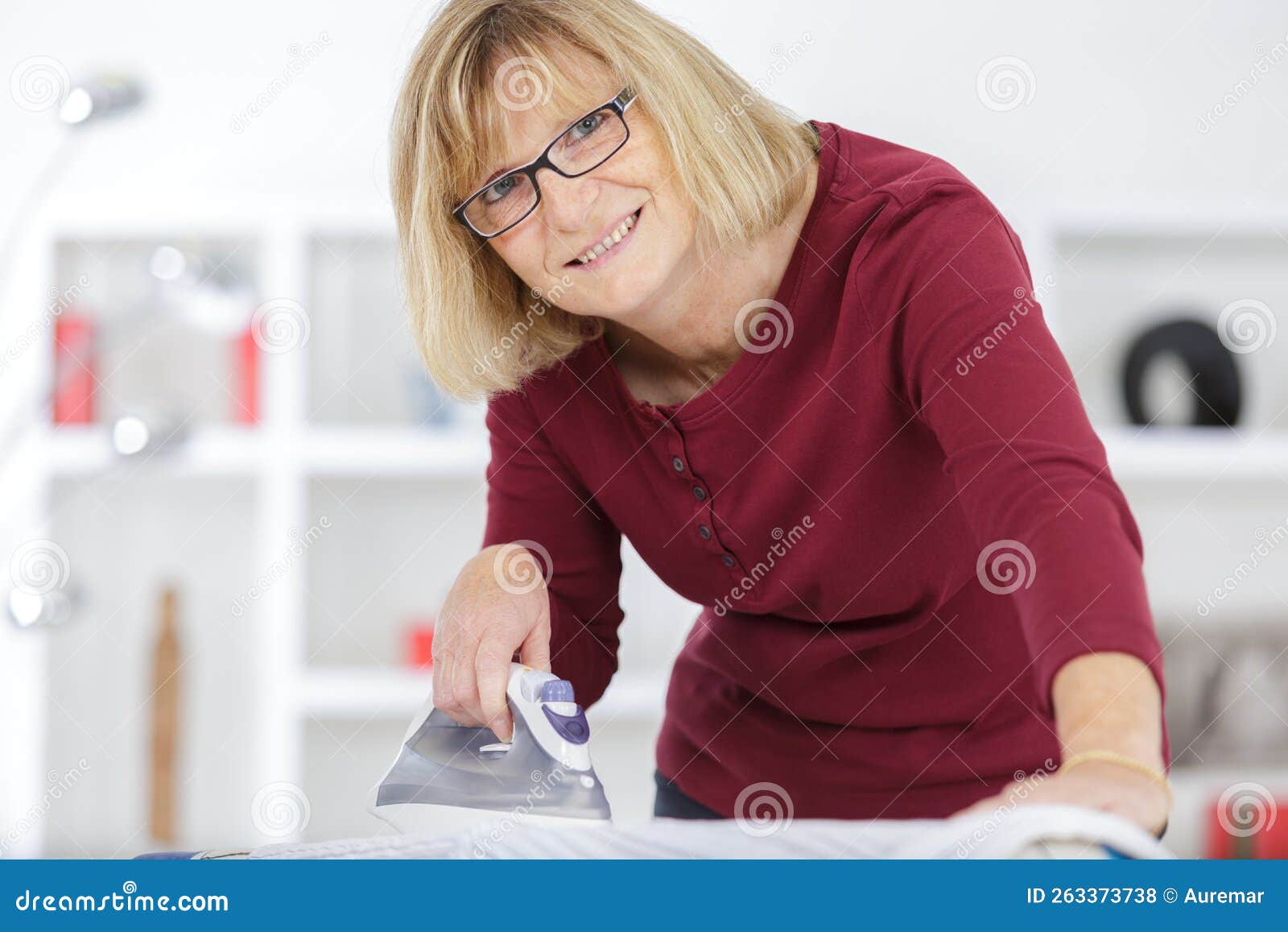 Happy Granny Doing daily Housework Stock Photo - Image of nurse ...