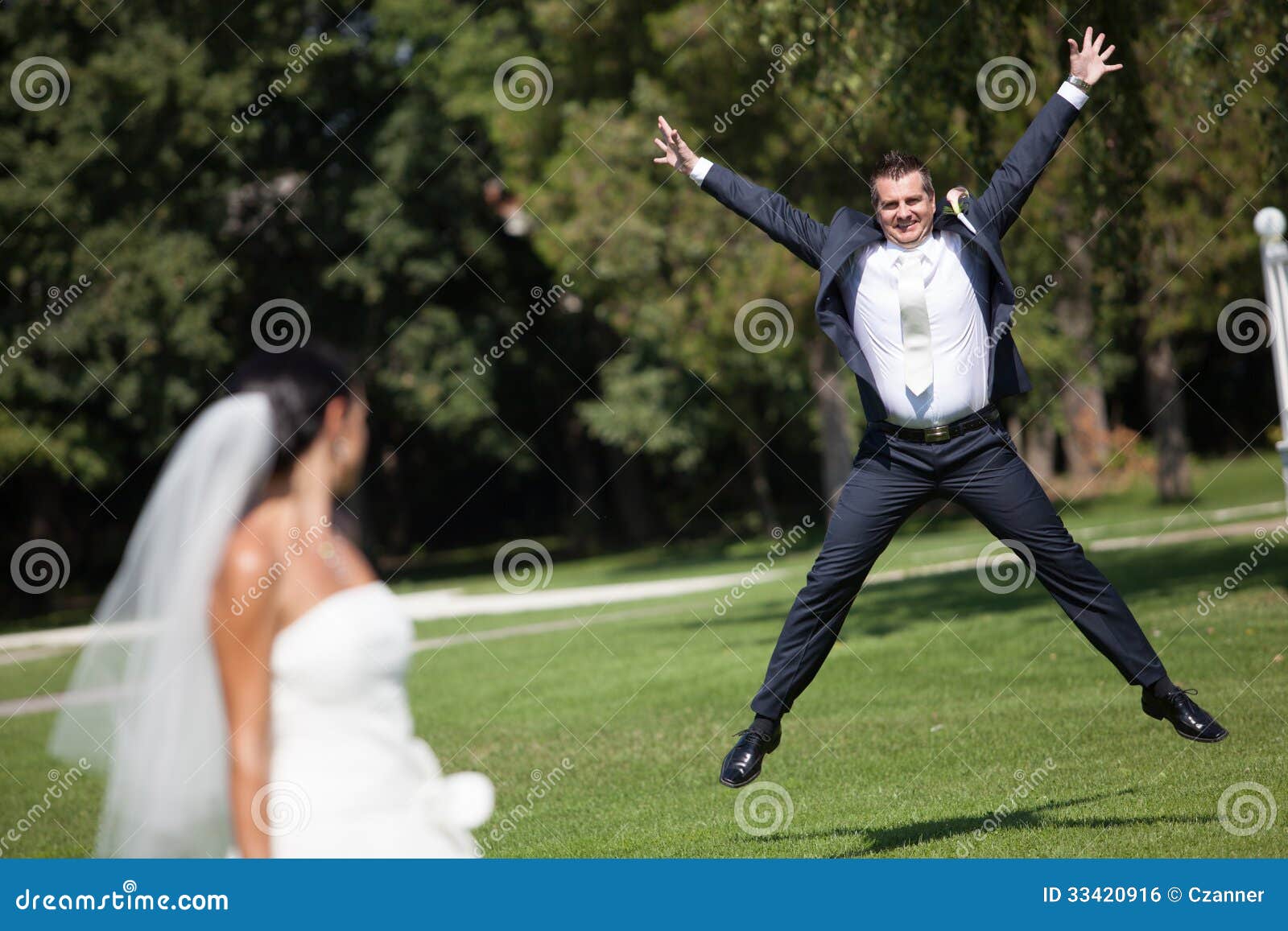 Happy groom in jump stock photo. Image of husband, face - 33420916