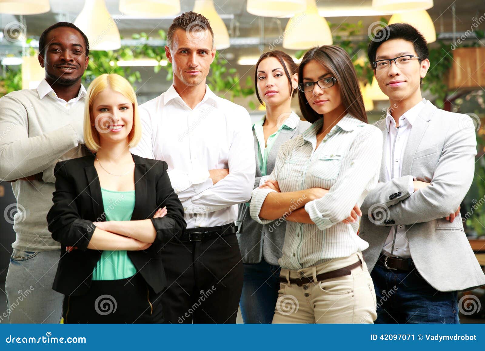 Happy Group of Co-workers with Arms Folded Stock Image - Image of ...
