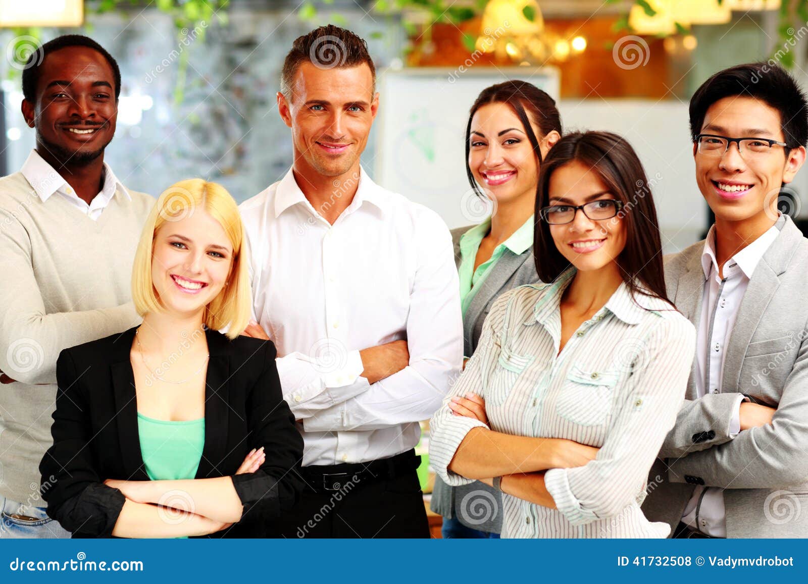 Happy Group of Co-workers Standing Stock Photo - Image of businesswoman ...