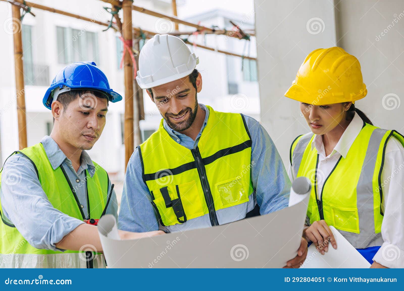 Happy Group of Construction Worker Team Working with Architect and ...