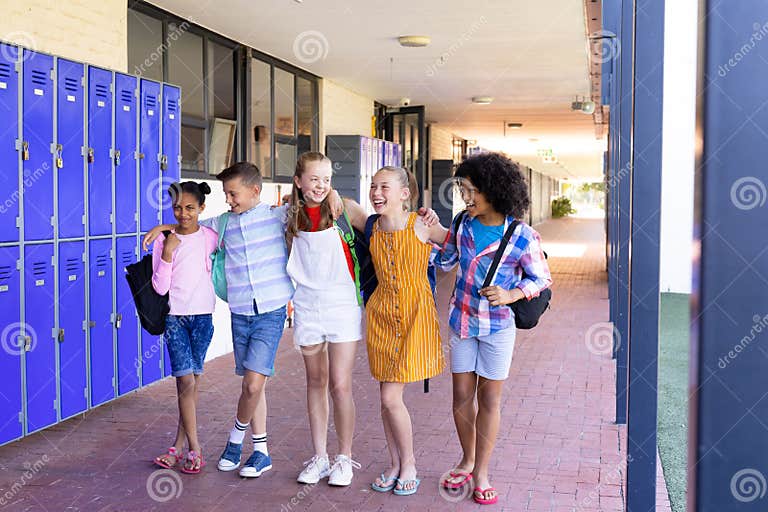 Happy Group of Diverse Children Standing with Arms Around Shoulders in ... Happy Group of Diverse Children Standing with Arms Around Shoulders in ...