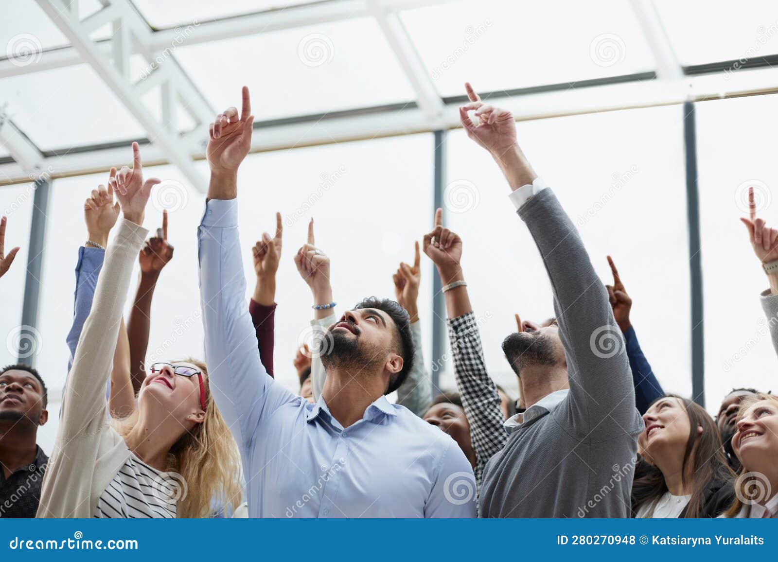 Group of Diverse Young People Holding Their Hands Up Stock Photo ...