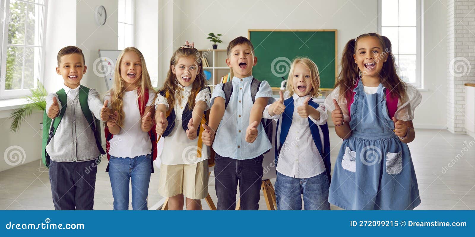 Happy Group Elementary School Students Showing Thumbs Up Standing ...