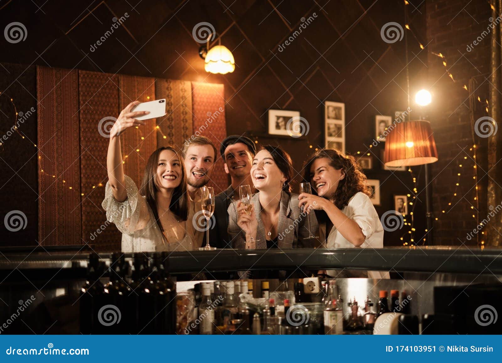 Happy Group of Friends at the Bar Having Drinks. Stock Image - Image of ...
