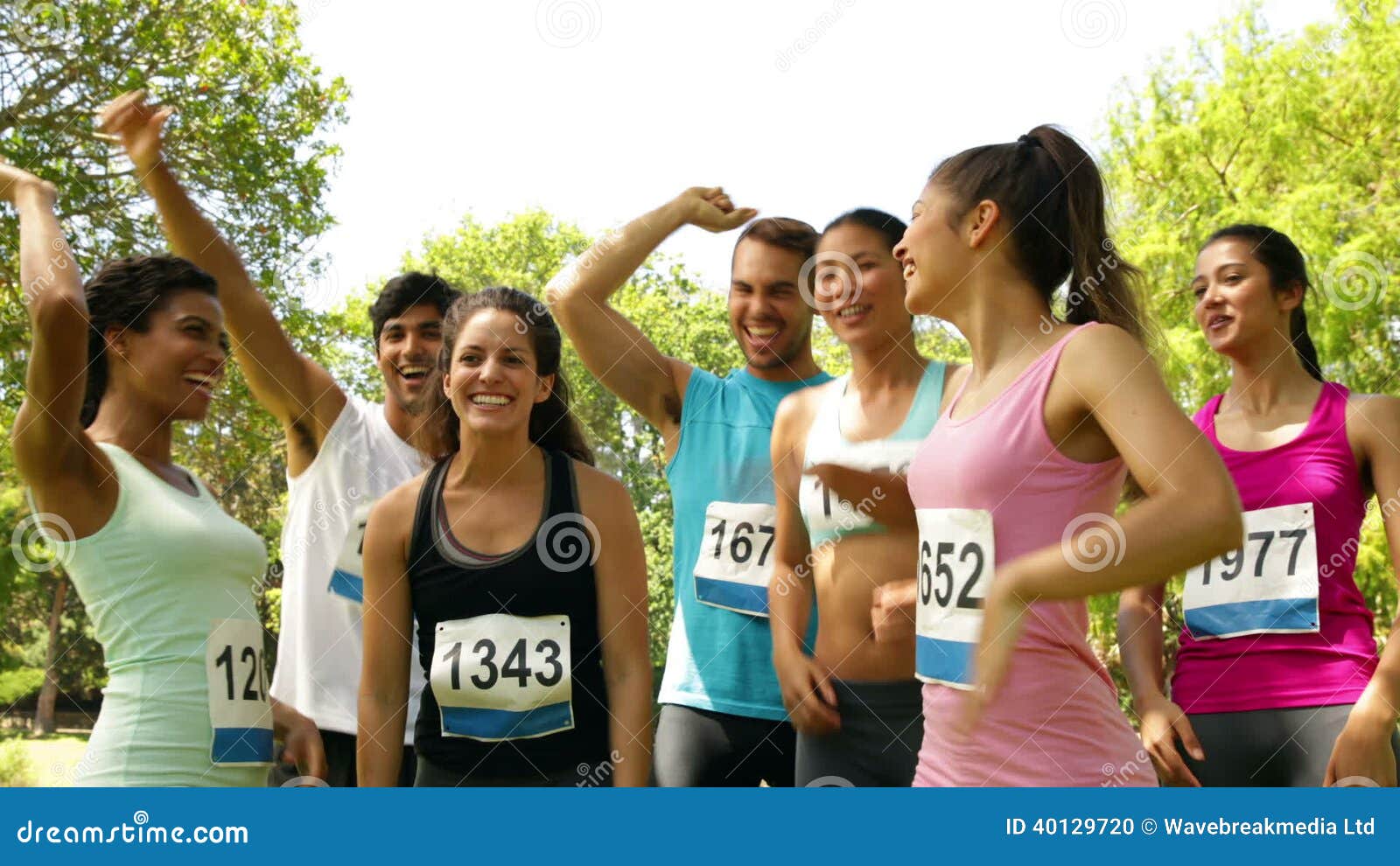 Happy Group of Friends Cheering after Running a Race Stock Footage ...