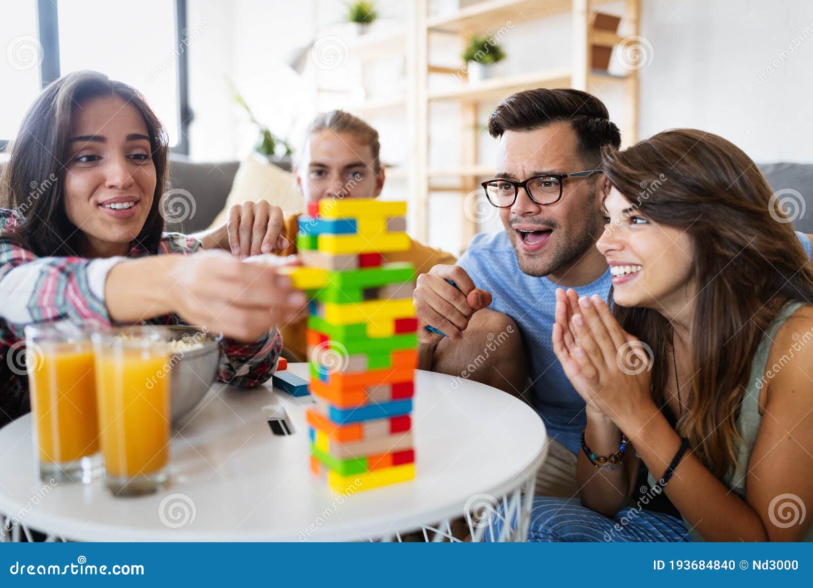 Happy Group of Friends Have Fun and Playing Board Game Together Stock ...