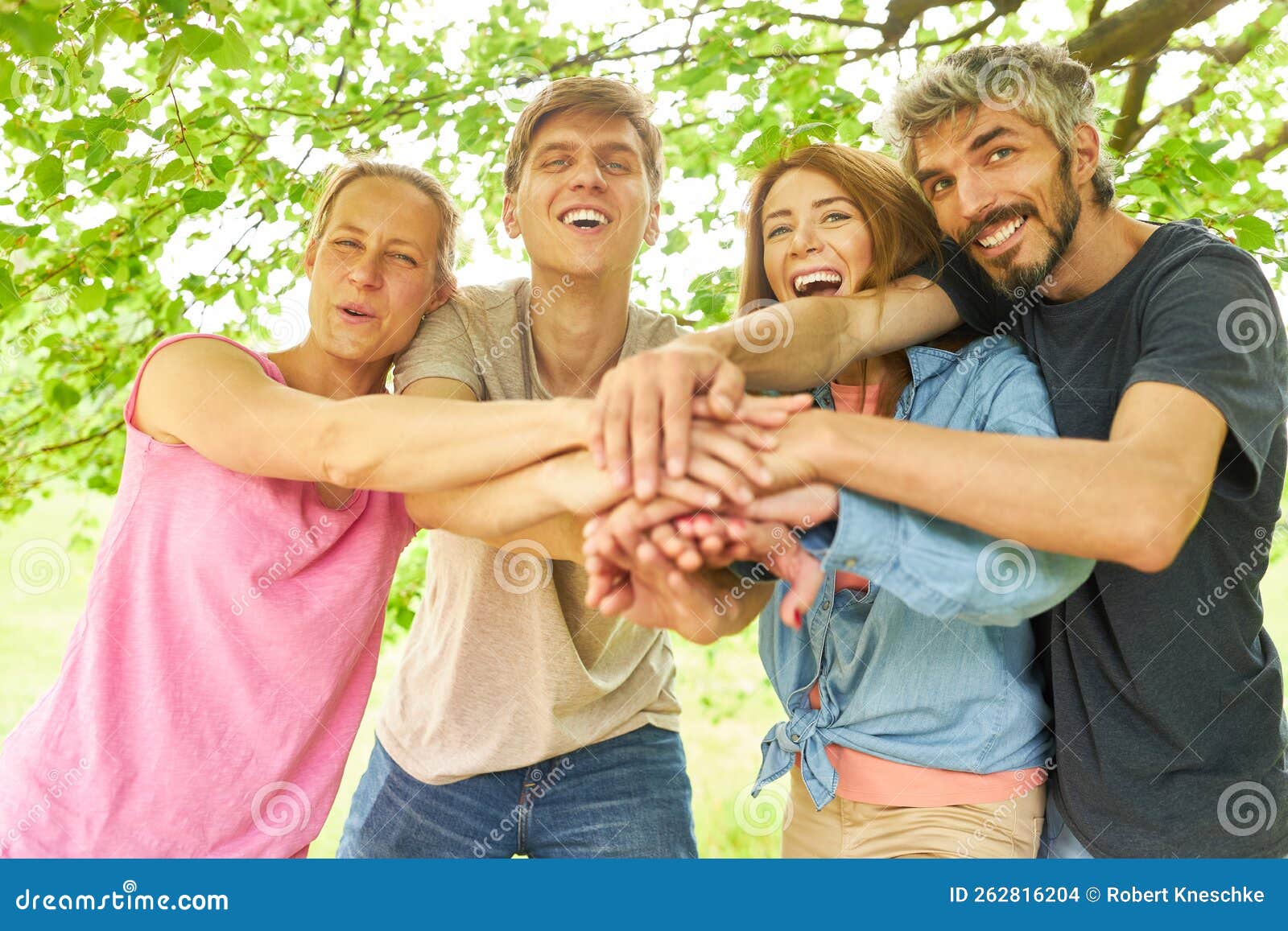 Happy Group of Friends while Stacking Hands Stock Photo - Image of ...