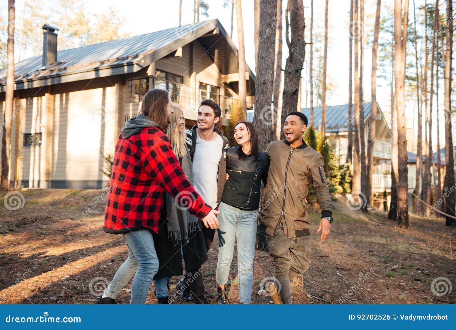 Happy Group of Friends Walking Outdoors in the Forest. Stock Photo ...