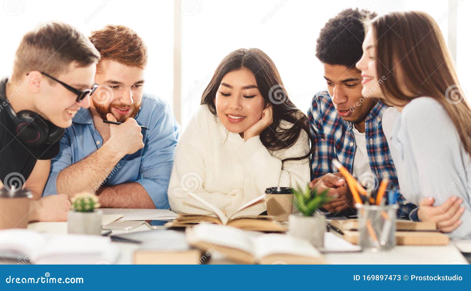 Happy Group of Students Reding Book in Library Stock Image - Image of ...