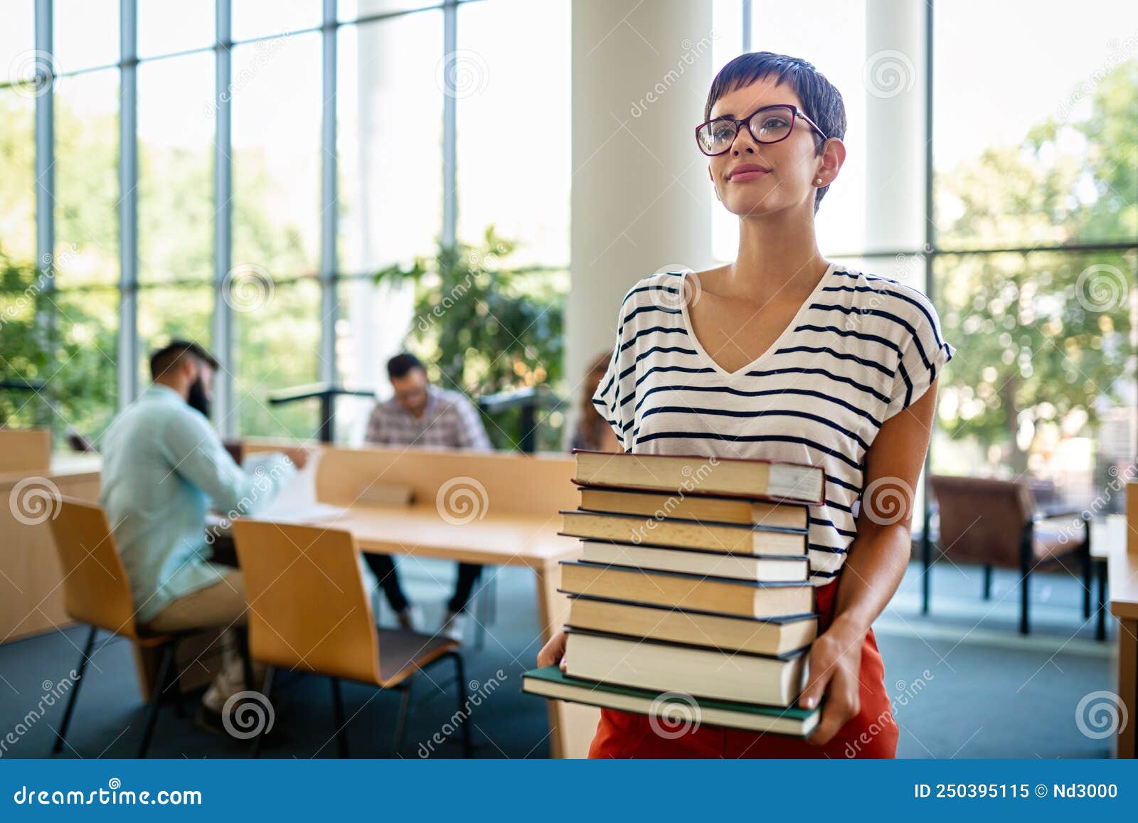 Happy Group of Students Studying and Working Together in a College ...