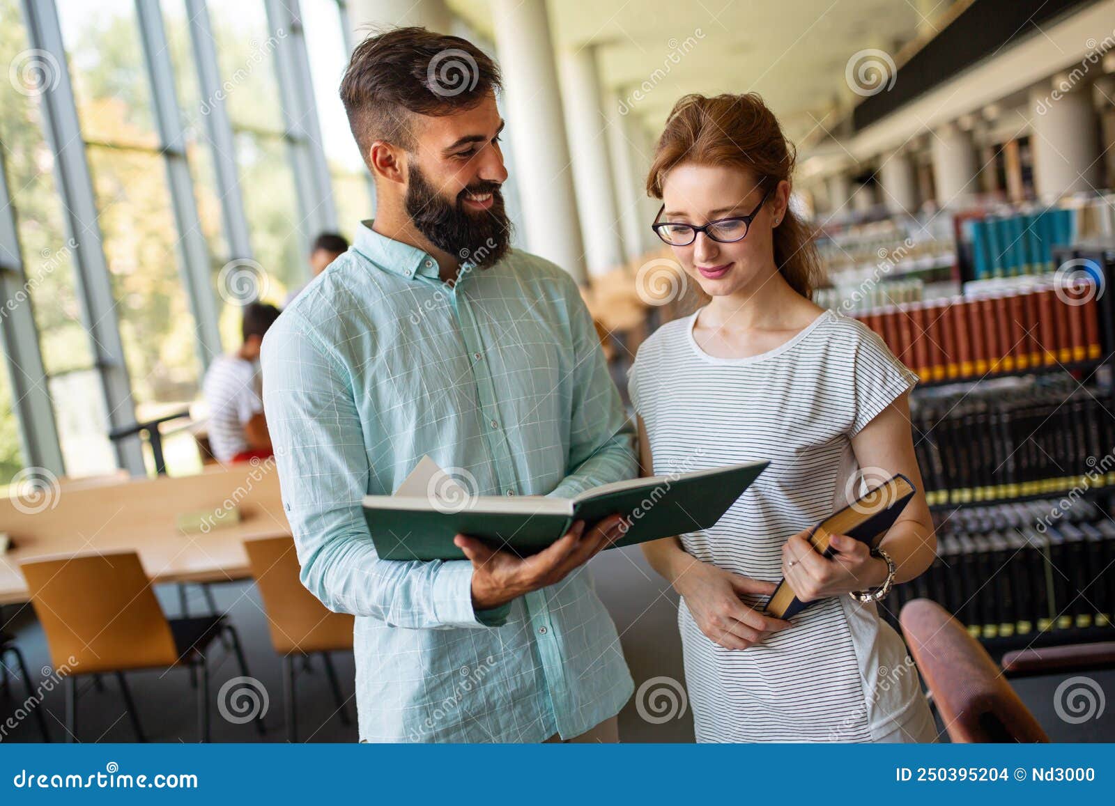 Happy Group of Students Studying and Working Together in a College ...
