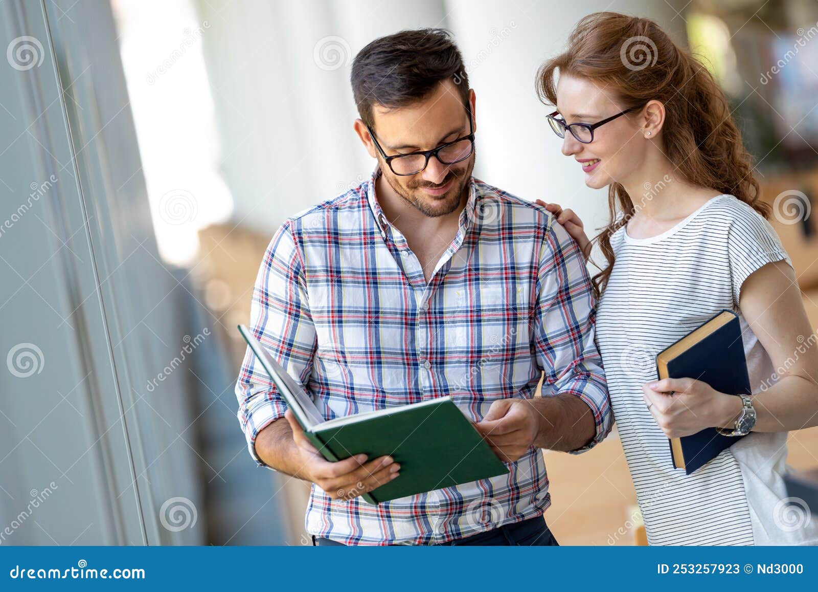 Happy Group of Students Studying and Working Together in a College ...