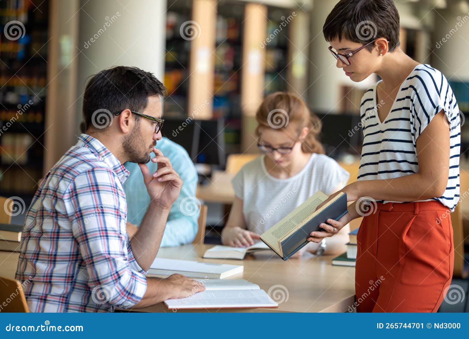 Happy Group of Students Studying and Working Together in a College ...