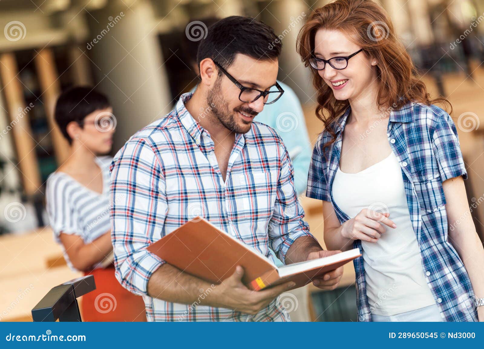 Happy Group of Students Studying and Working Together in a College ...