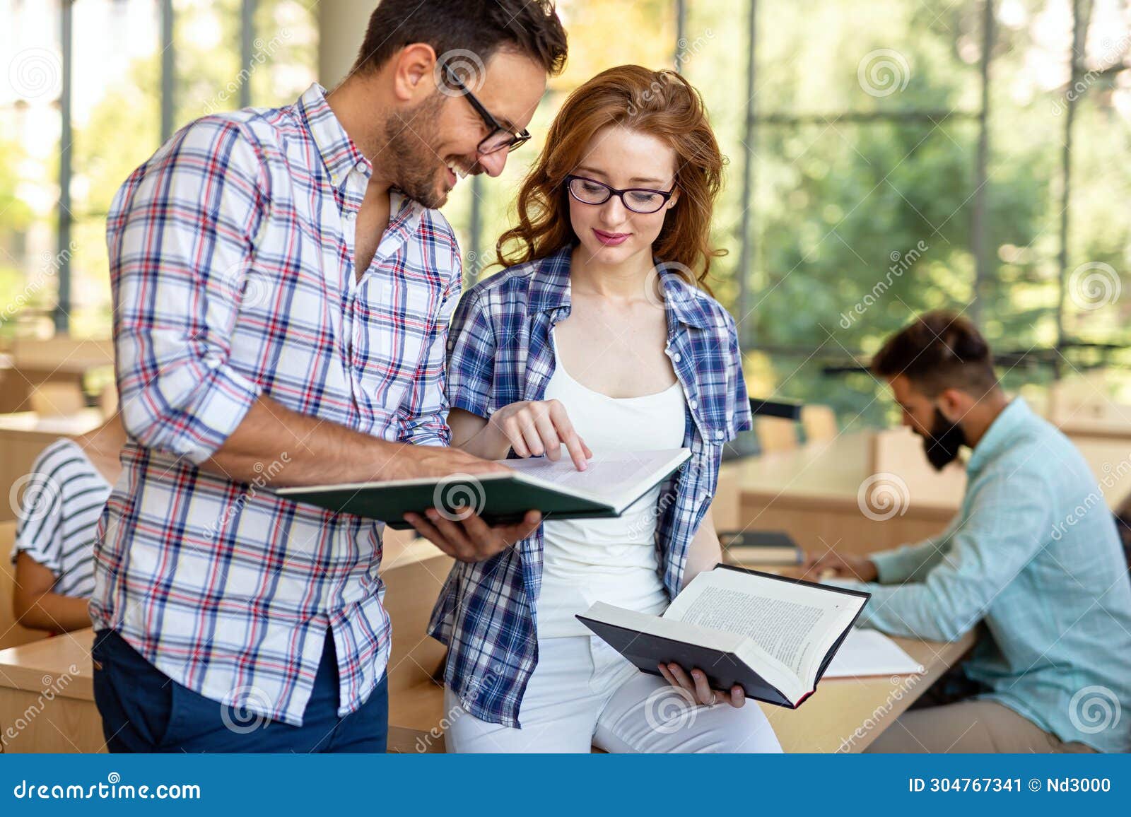 Happy Group of Students Studying and Working Together in a College ...