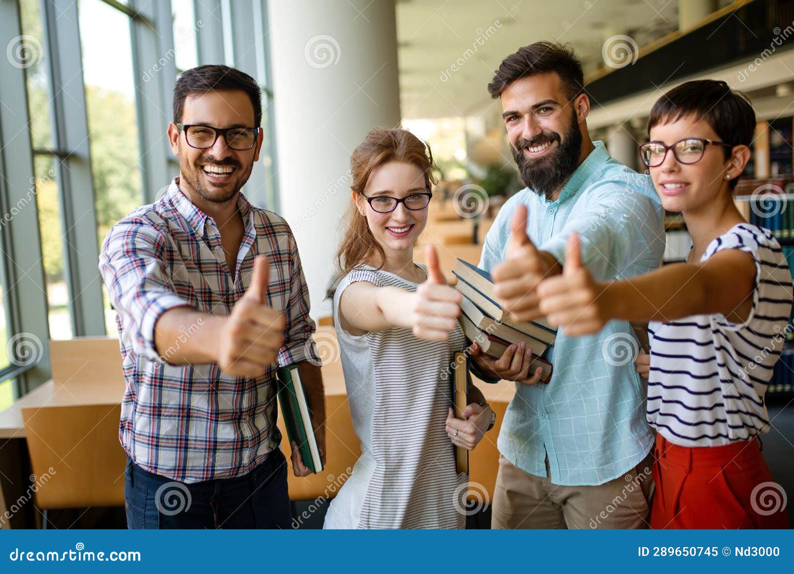 Happy Group of Success Students Studying and Working Together in a ...