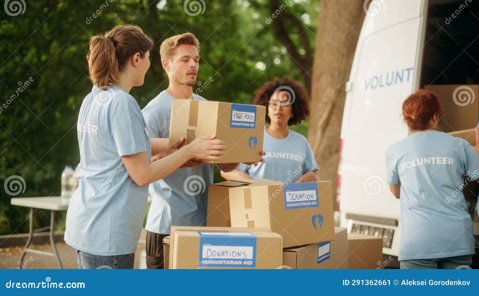 Happy Group of Volunteers Working on Delivering Humanitarian Aid and ...