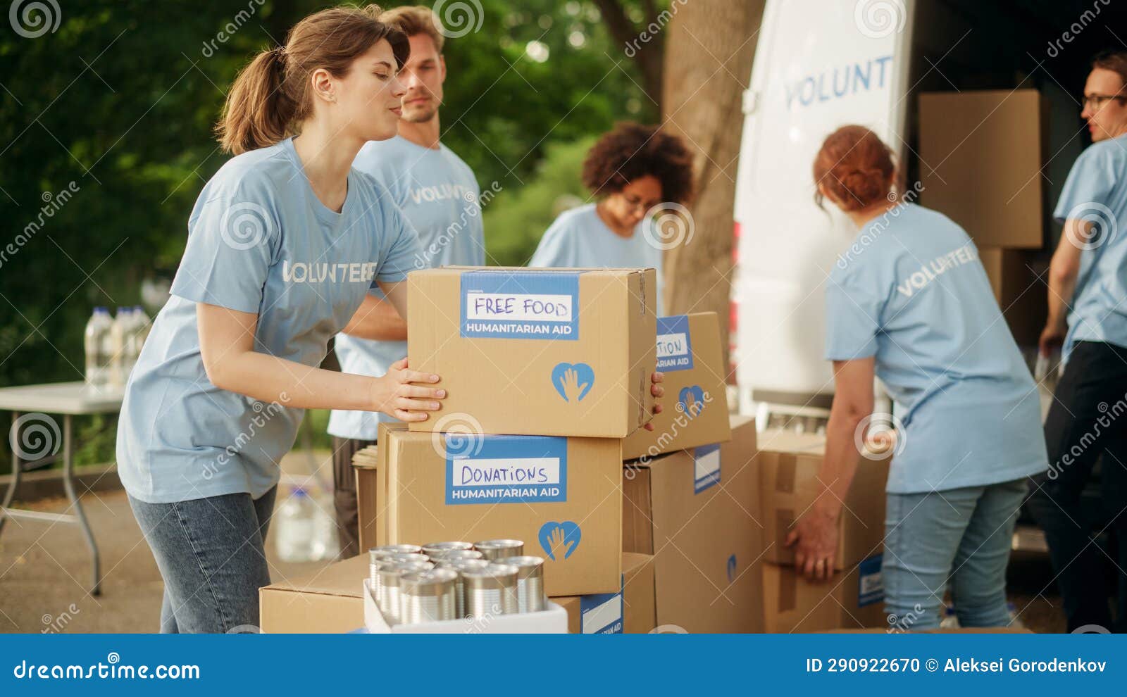 Happy Group of Volunteers Working on Delivering Humanitarian Aid and ...